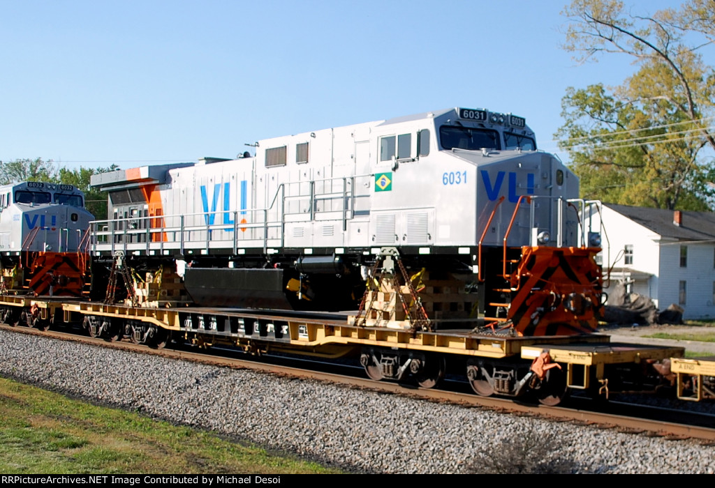 VLI BB40-9WM #6031 is one of 8 locomotives in this train heading east bound for the port of ...